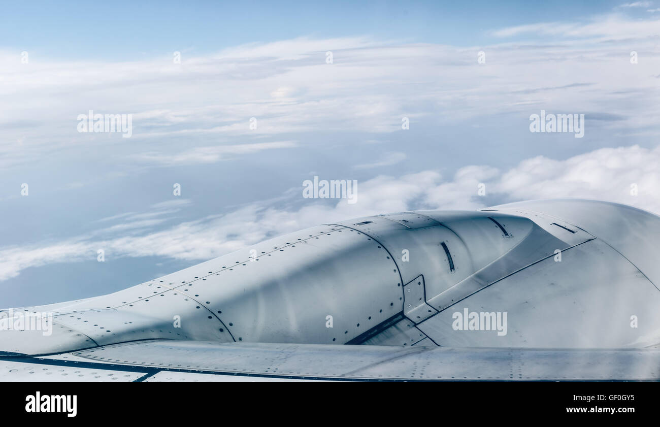 airplane engine over sunset clouds view from airplane window Stock ...