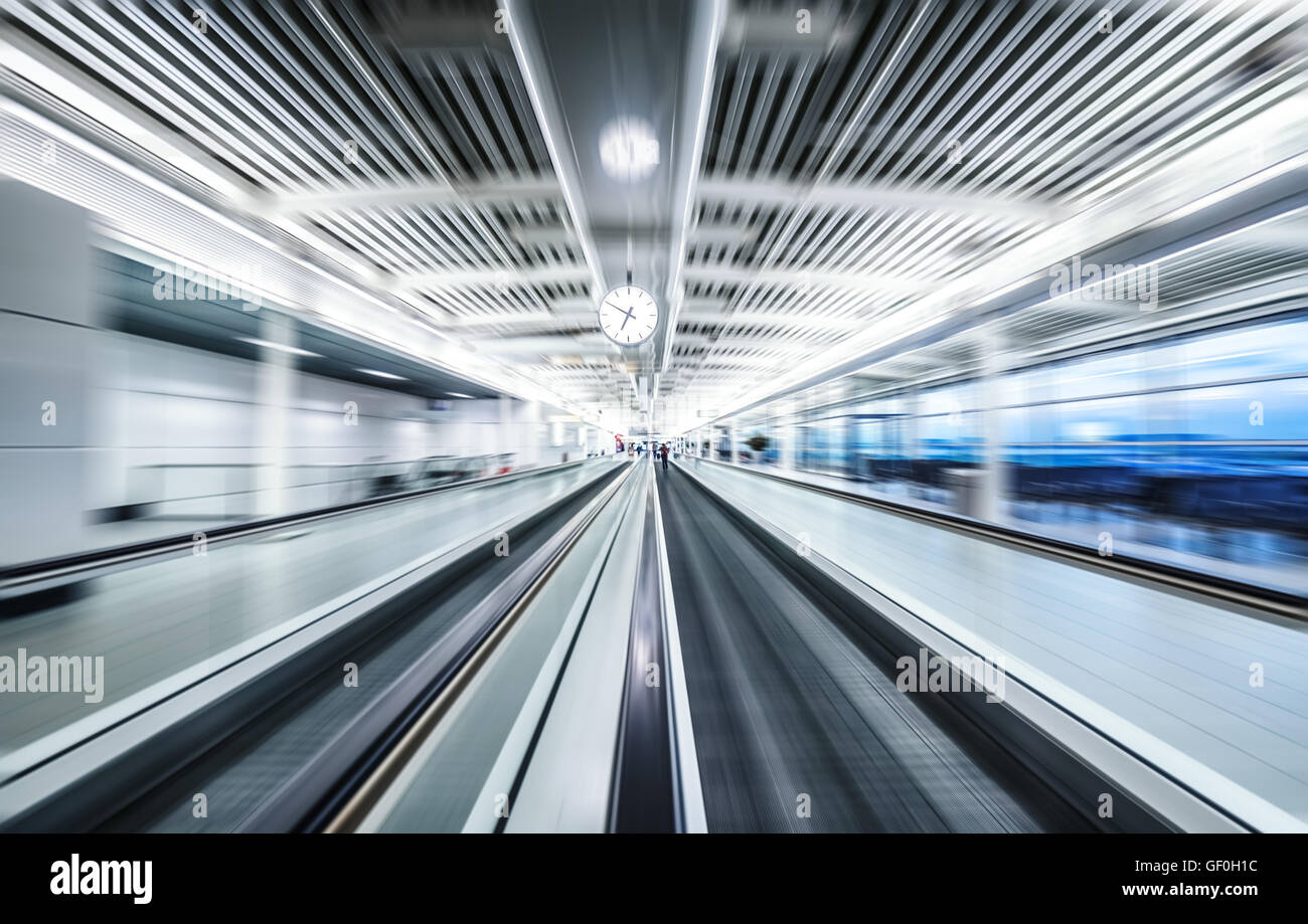 Airport terminal hi tech walkway. Motion blur effect. Time concept ...