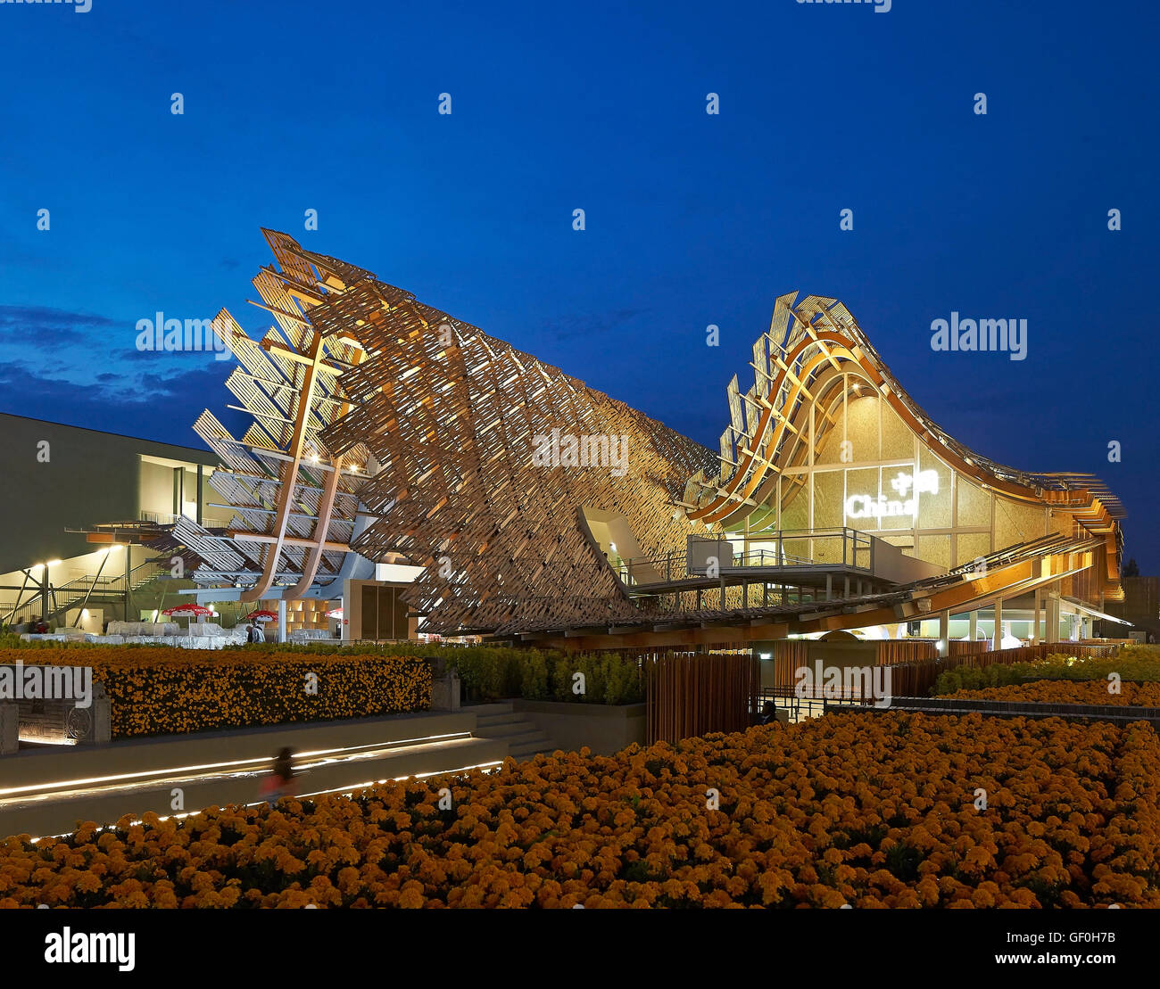 Night elevation from approach. Milan EXPO 2015, China Pavilion, Milan ...