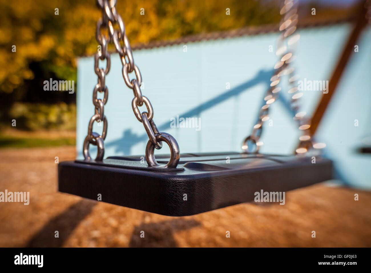 Picture of an swing in an outdoor playground Stock Photo - Alamy