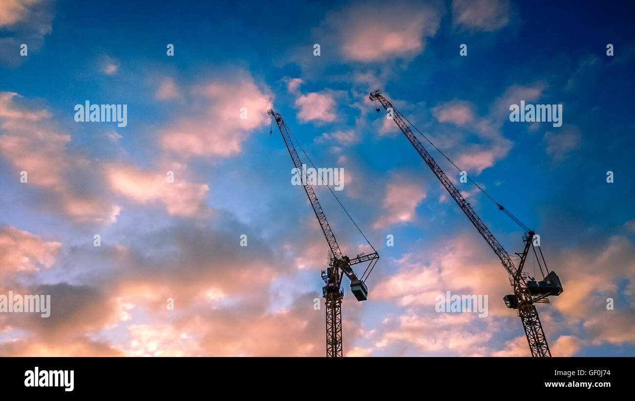 Two cranes working on one of many central London building sites Stock ...
