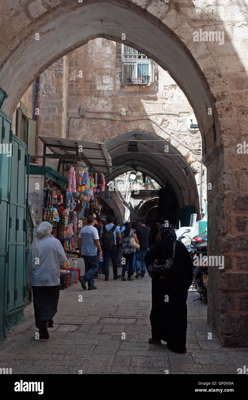 Jerusalem: people in the alleys of the Old City, a walled area in which ...