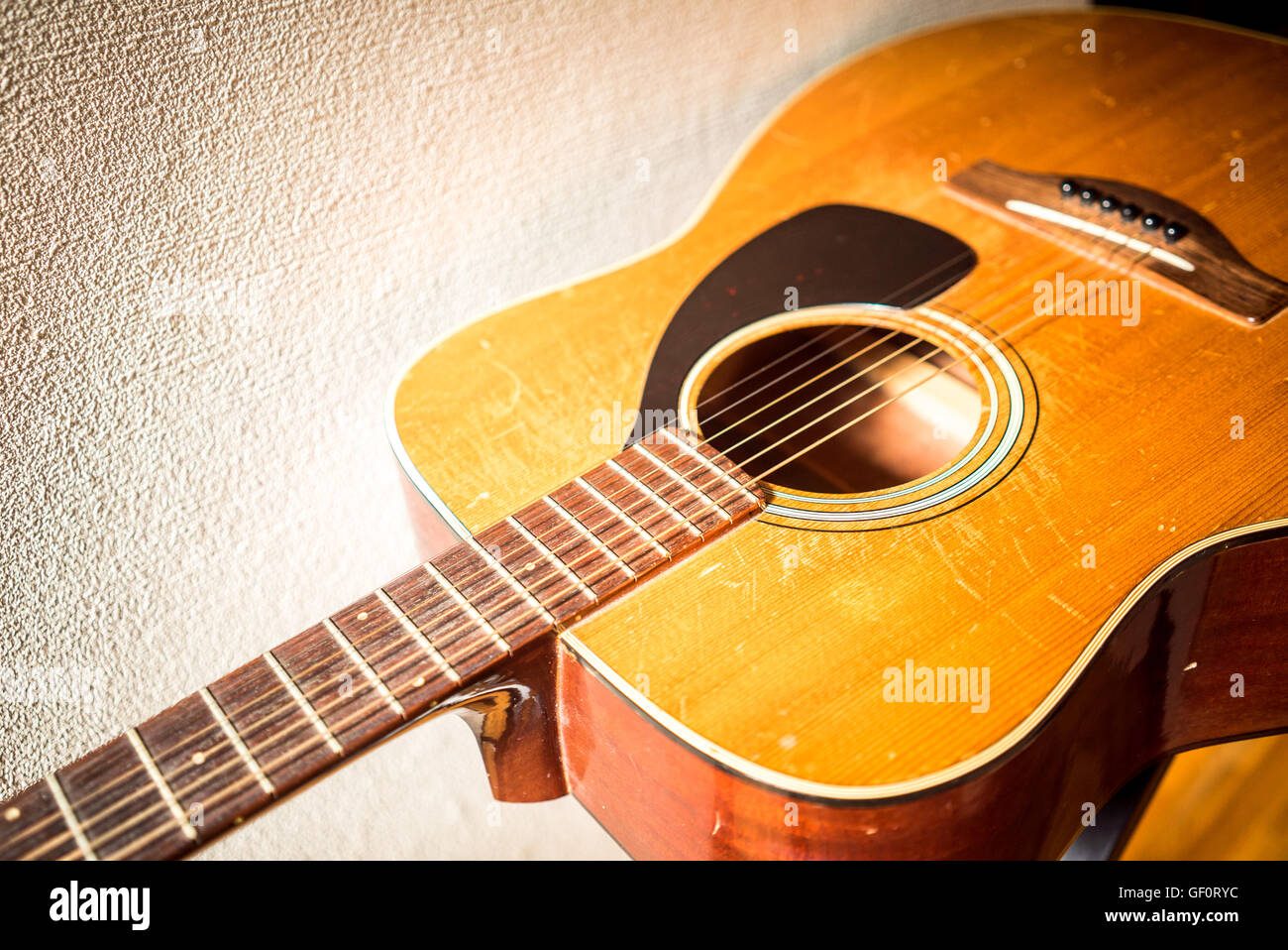 Vintage acoustic guitar Stock Photo - Alamy