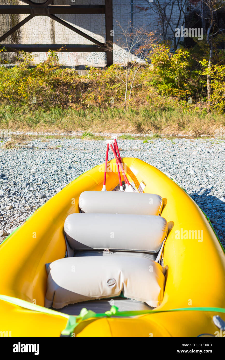 Yellow rubber boat Stock Photo - Alamy