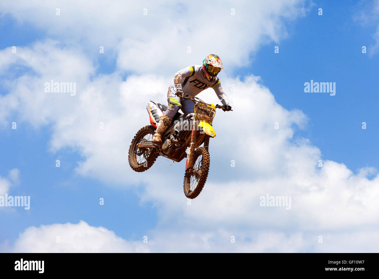 Motocross rider and bike clearing a tabletop jump during the final heat ...