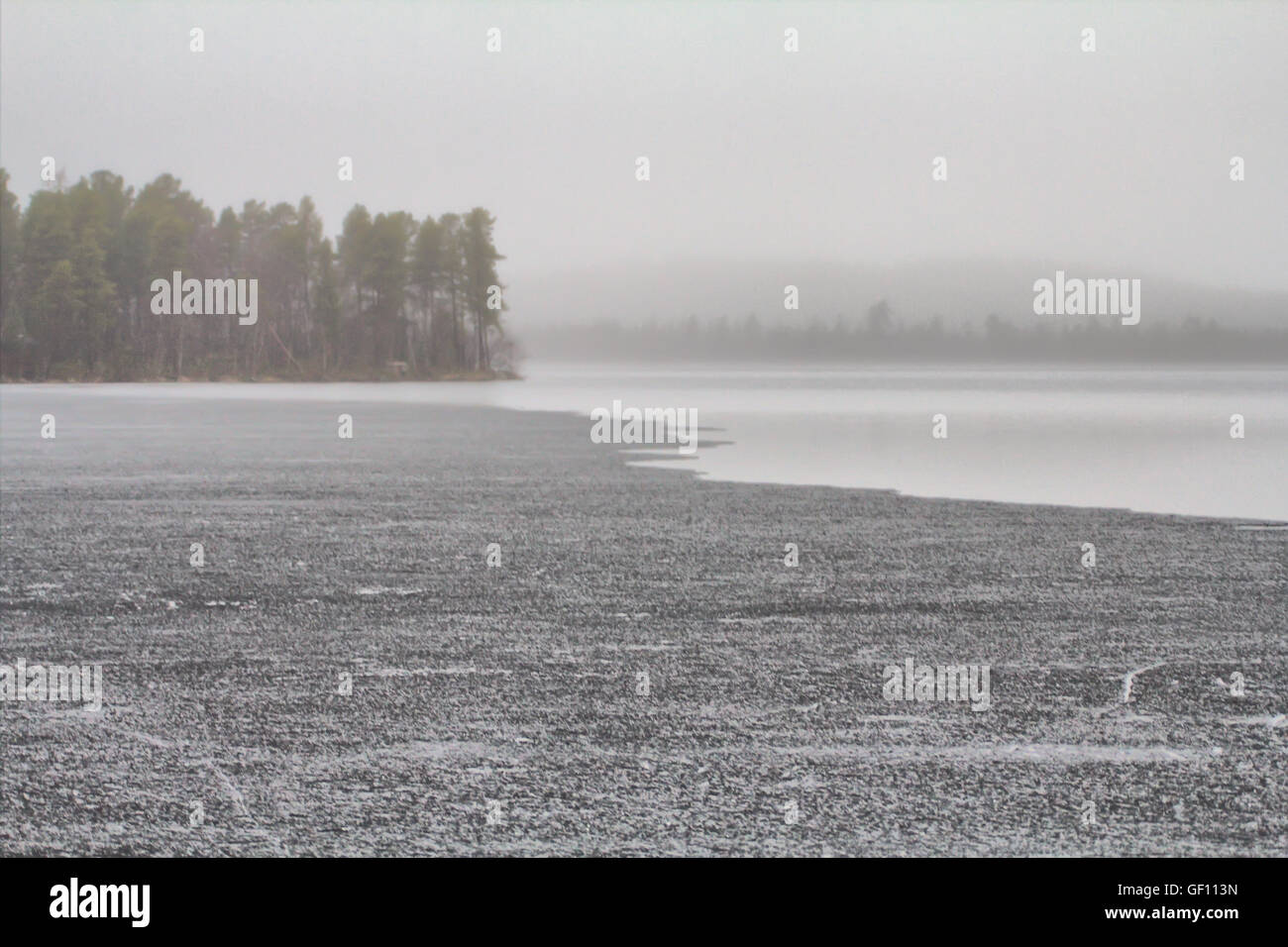 melt pond with water taken from a low point. Near snow Stock Photo - Alamy