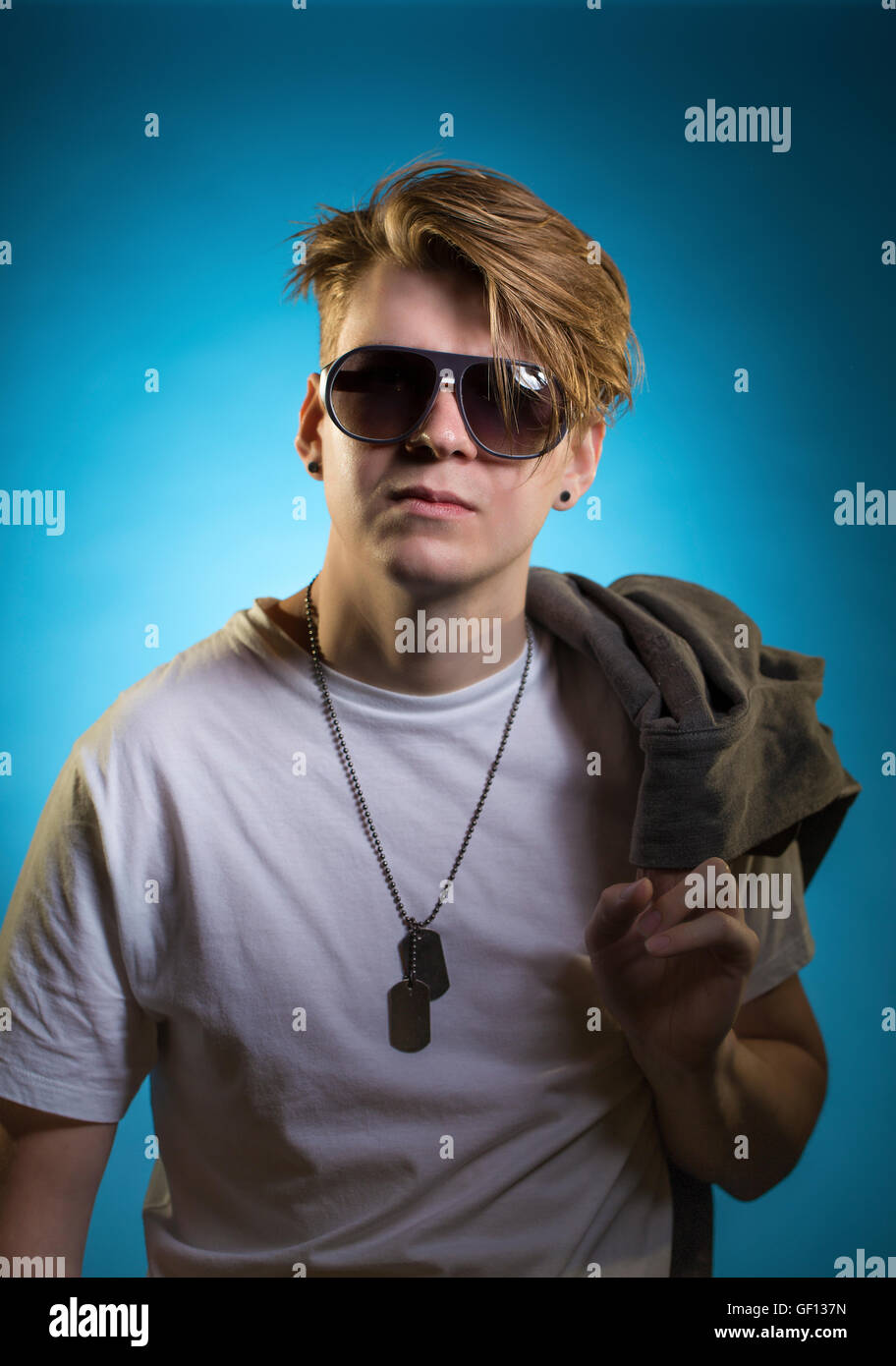 Male model portrait, sunglasses, hair, styling, fashion, blue ...