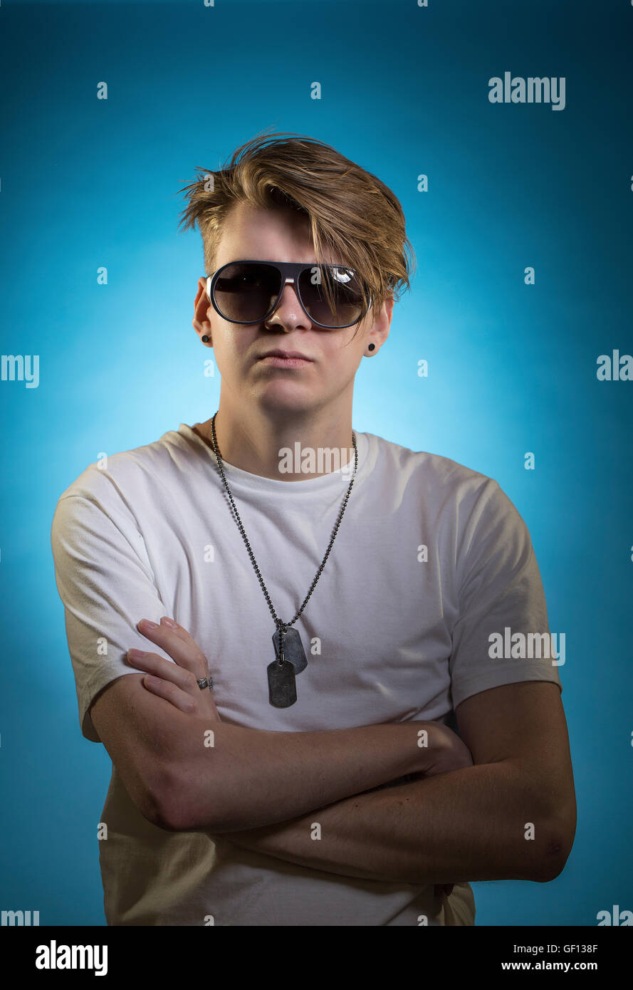 Male model portrait, sunglasses, hair, styling, fashion, blue ...