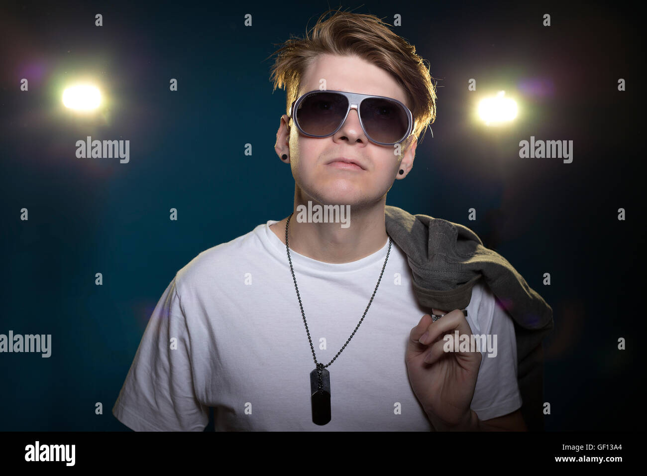 Male model portrait, sunglasses, hair, styling, fashion, blue ...