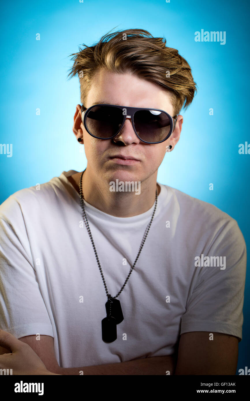 Male model portrait, sunglasses, hair, styling, fashion, blue ...