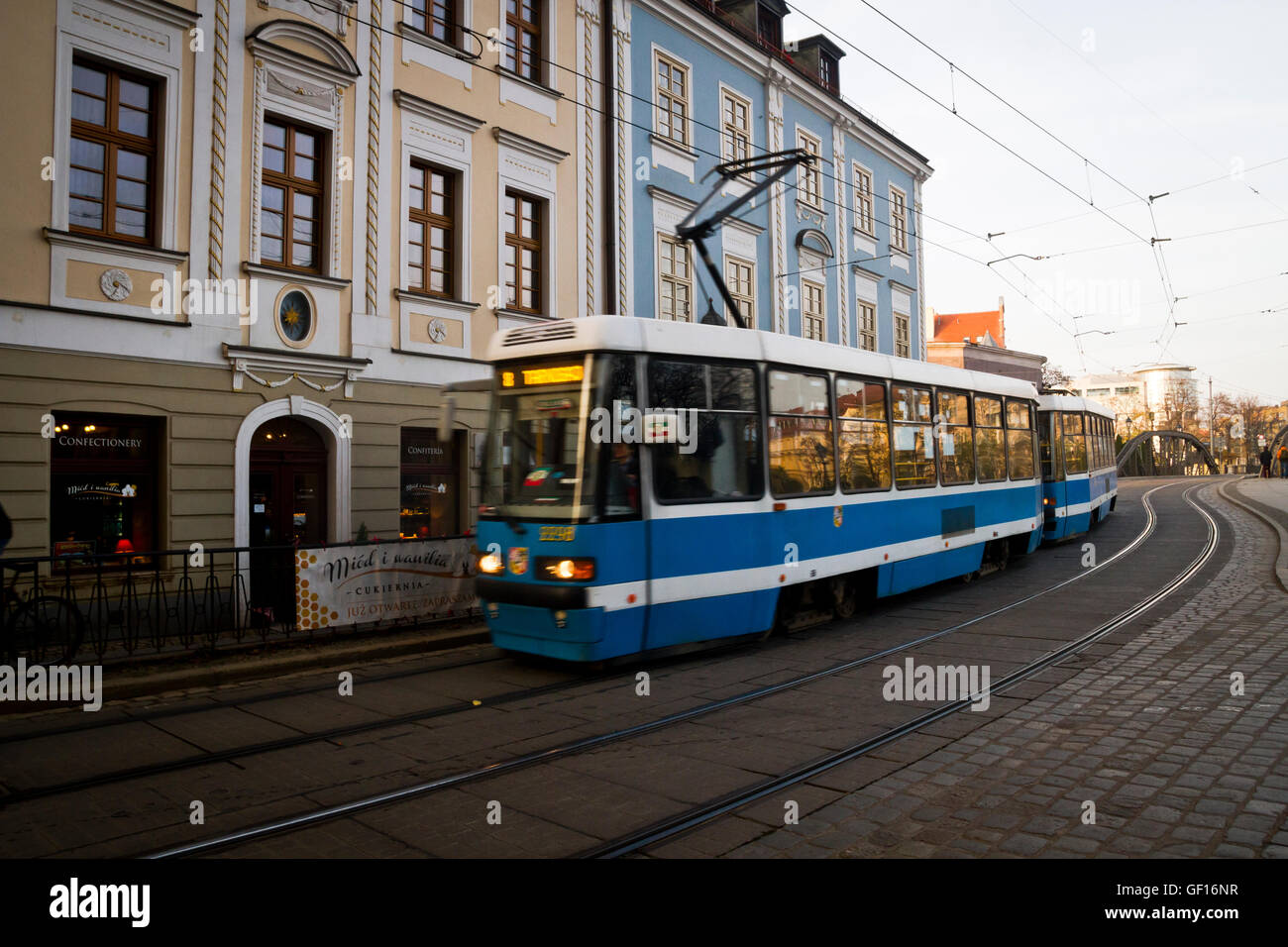 A tram travels along a street in Wroclaw, Poland Stock Photo - Alamy