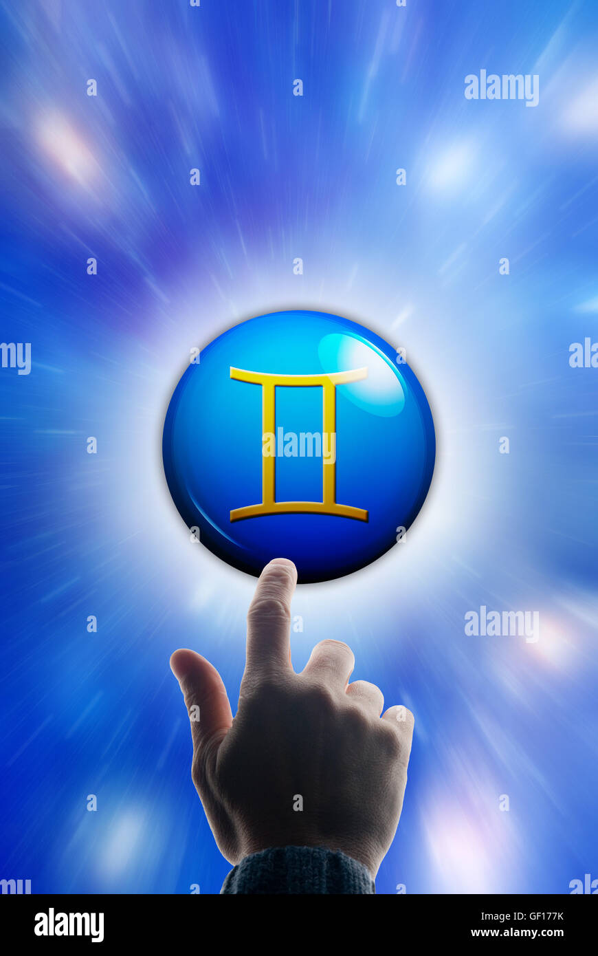hand touching a button with the zodiac symbol of Gemini Stock Photo - Alamy