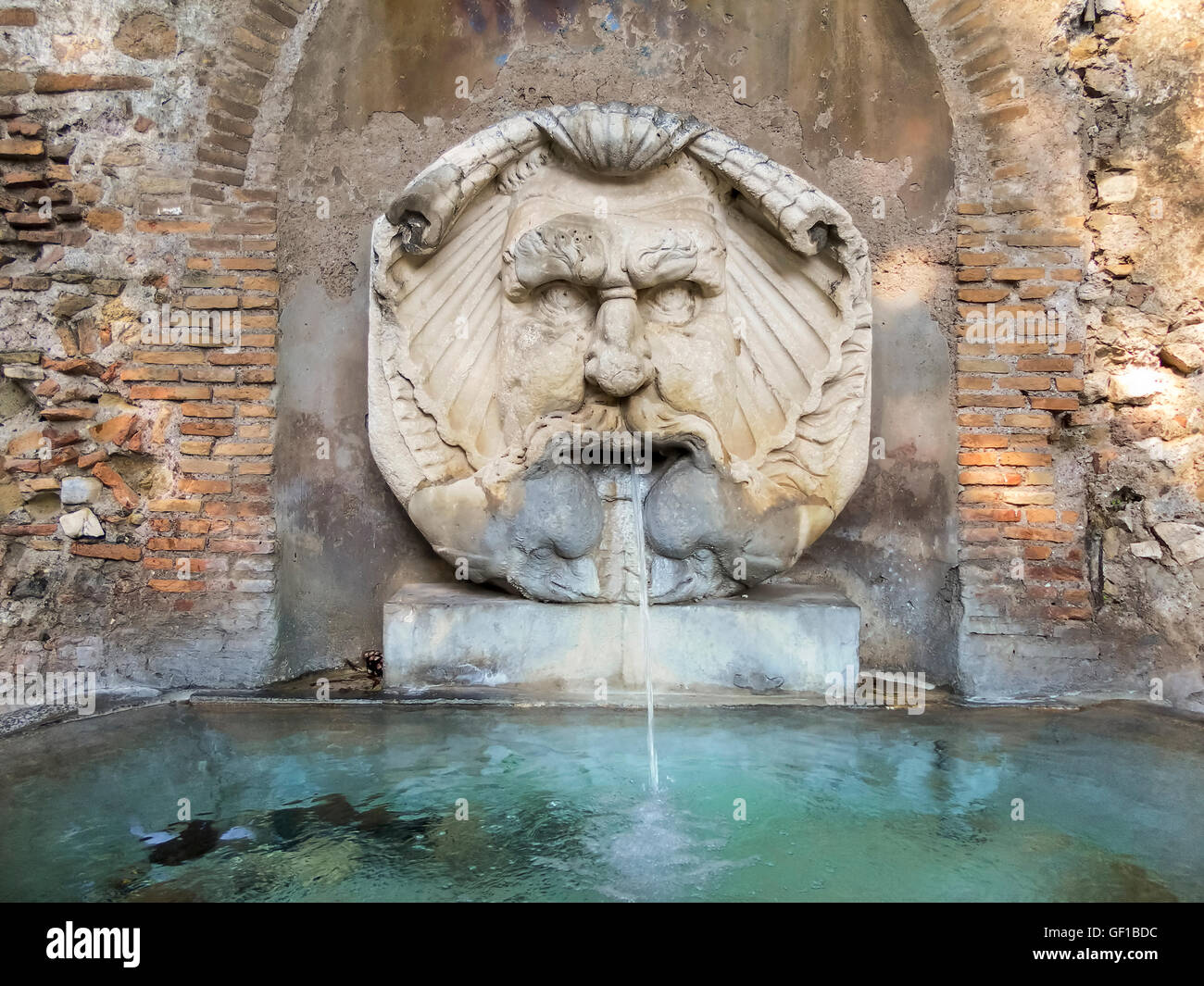 Old water spitting fountain in Rome, Italy Stock Photo - Alamy