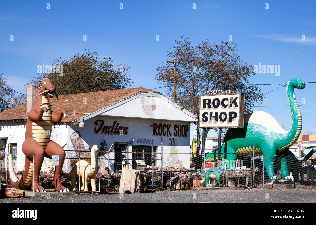 Colorful dinosaur statues guard a classic rock shop along old Route 66 ...