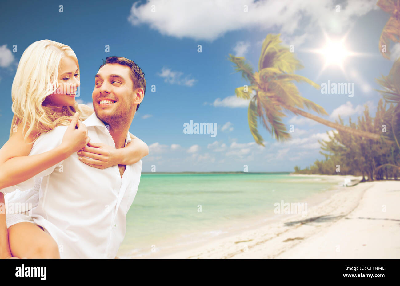 happy couple having fun over summer beach Stock Photo - Alamy