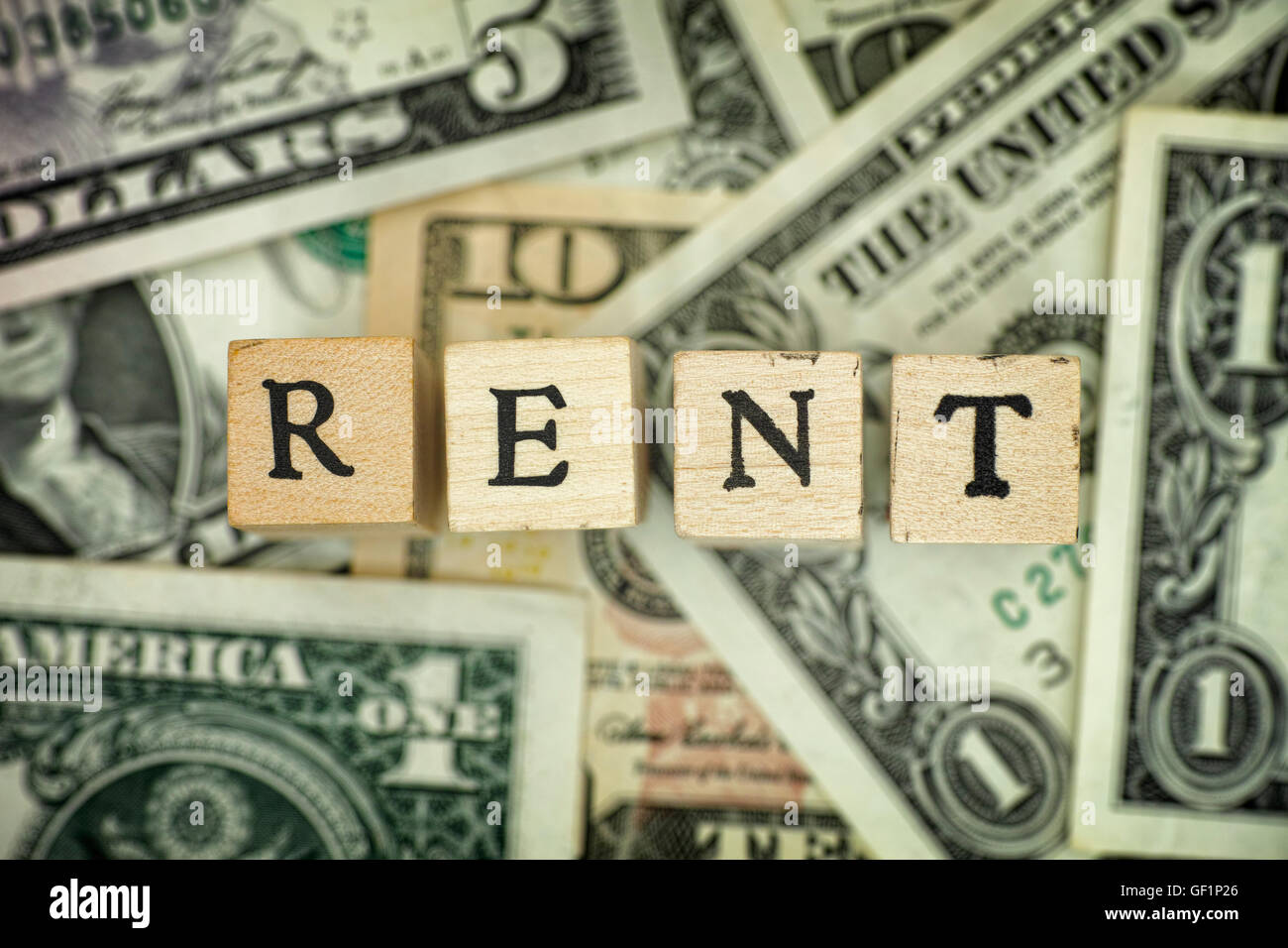 Word RENT on dollar bills. Concept image Stock Photo - Alamy