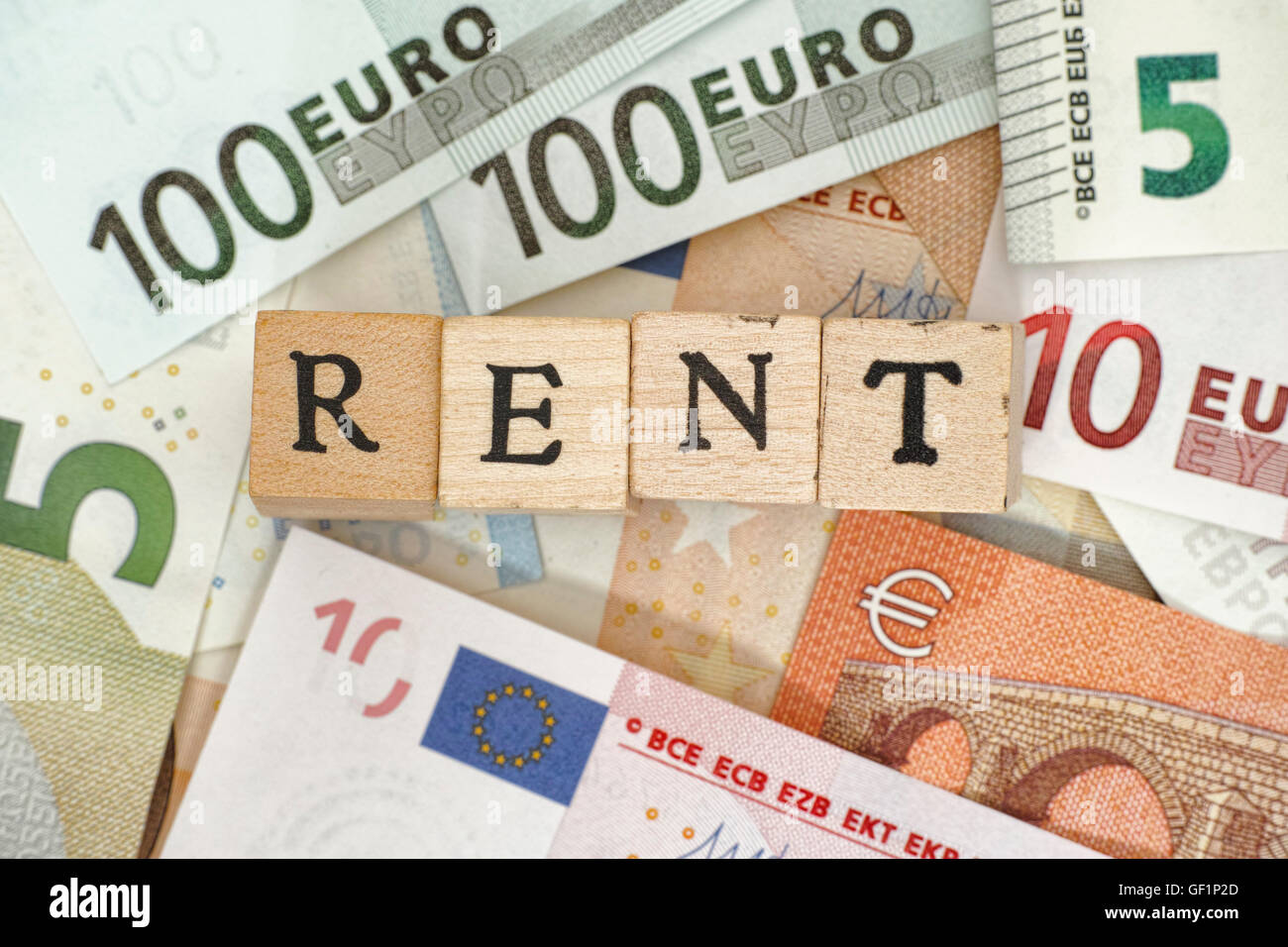 Word RENT on euro banknotes. Concept image Stock Photo - Alamy