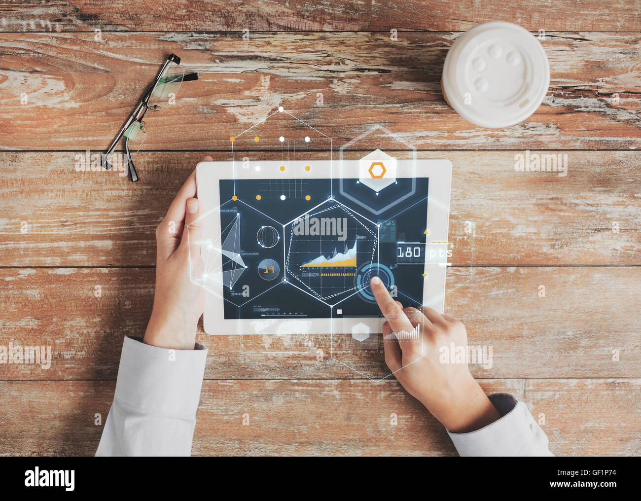 close up of hands with tablet pc and virtual graph Stock Photo - Alamy