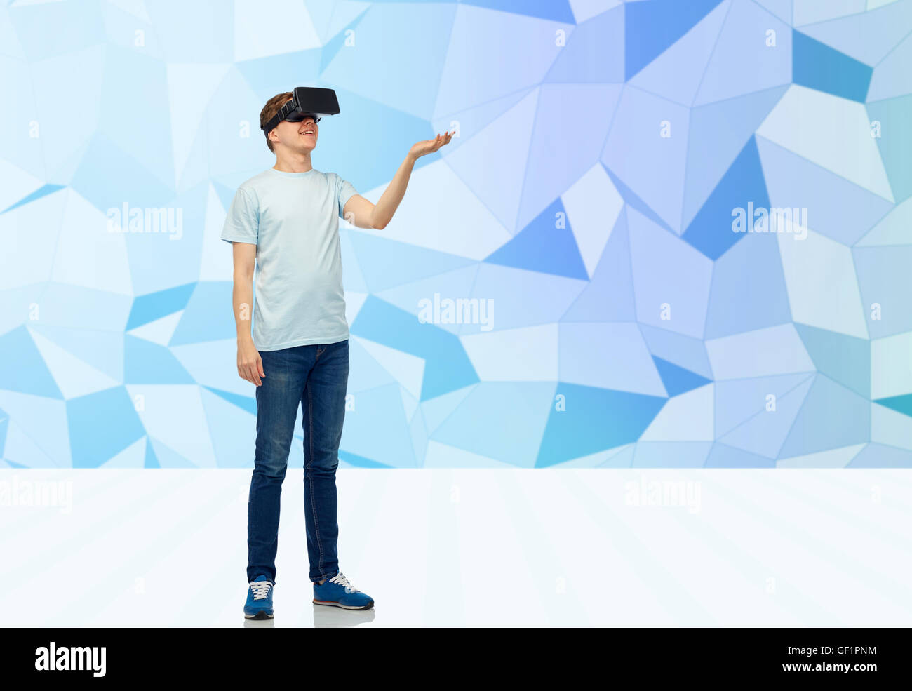 happy man in virtual reality headset or 3d glasses Stock Photo - Alamy