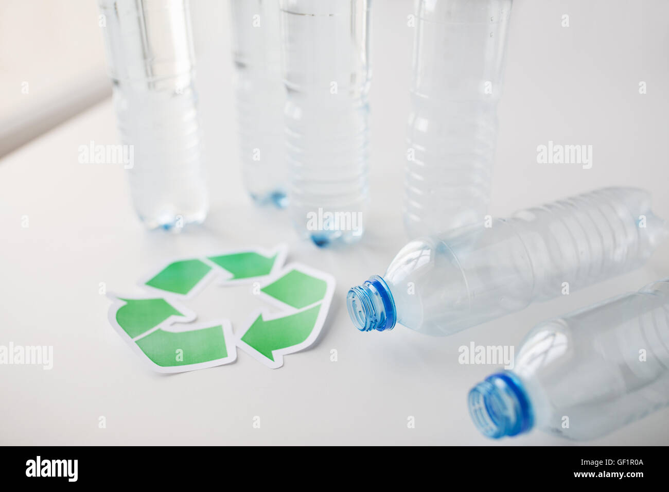 close up of plastic bottles and recycling symbol Stock Photo - Alamy
