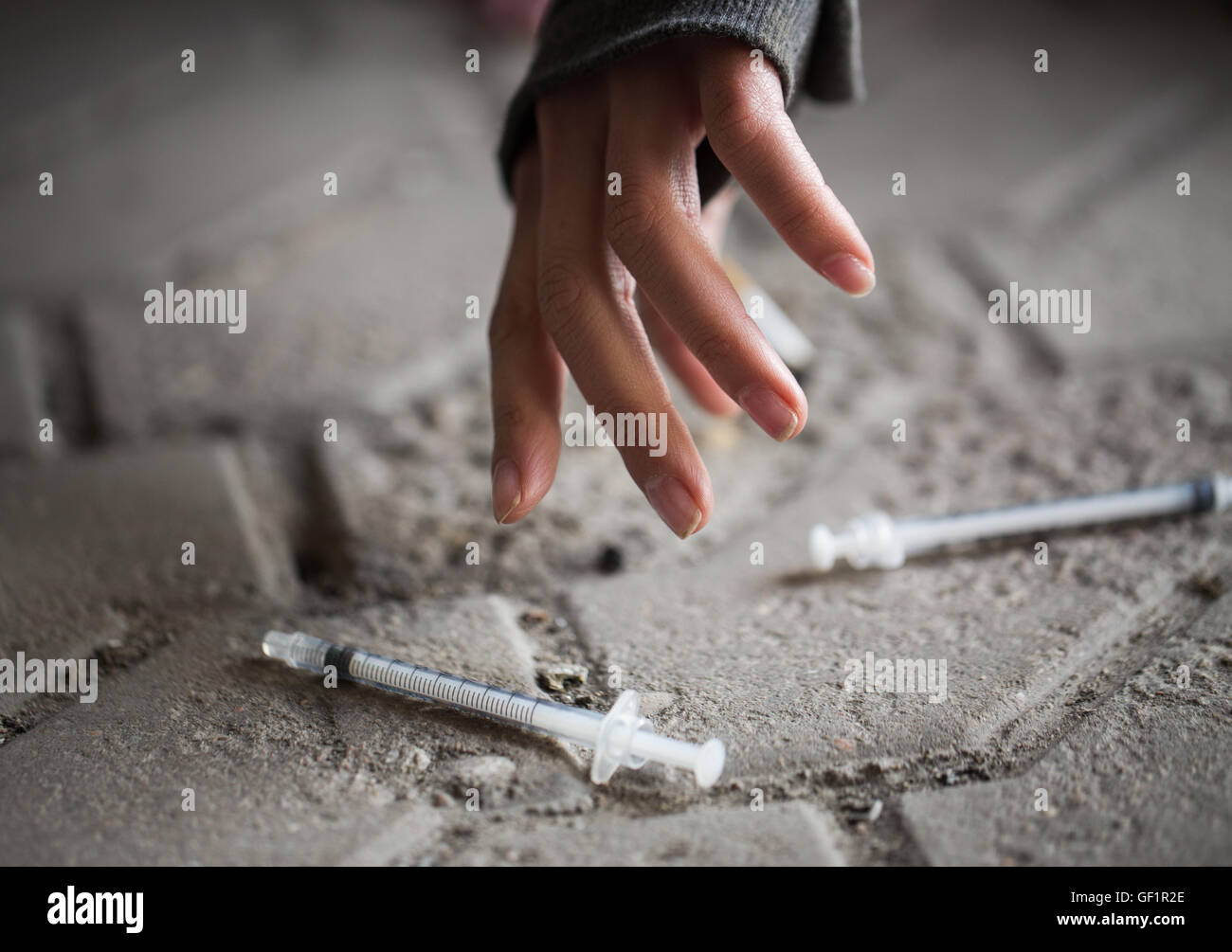 close up of addict woman hands and drug syringes Stock Photo - Alamy