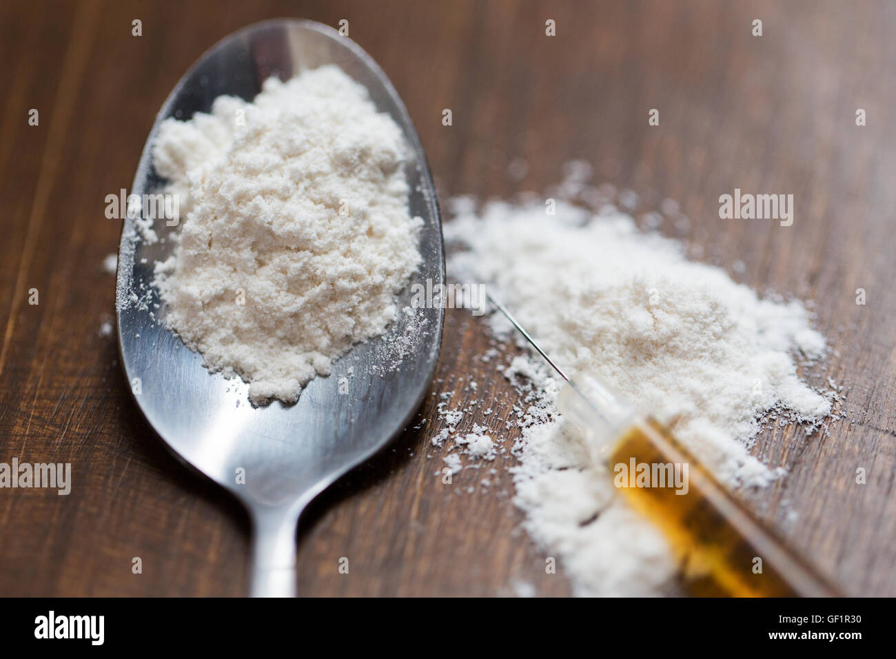 close up of spoon and syringe with drug dose Stock Photo - Alamy