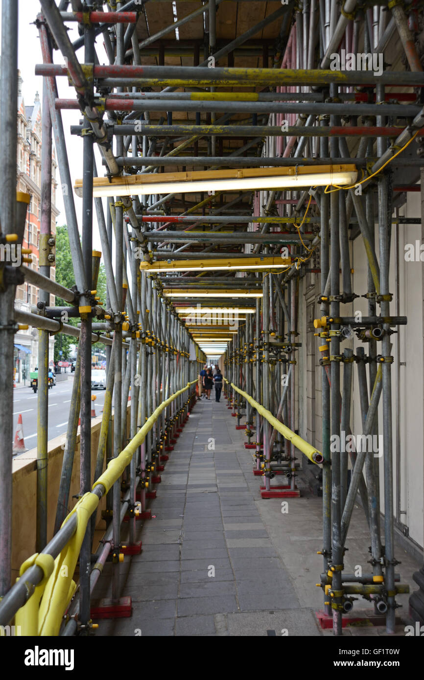 Scaffolding over the pavement, in Knightsbridge, London Stock Photo - Alamy