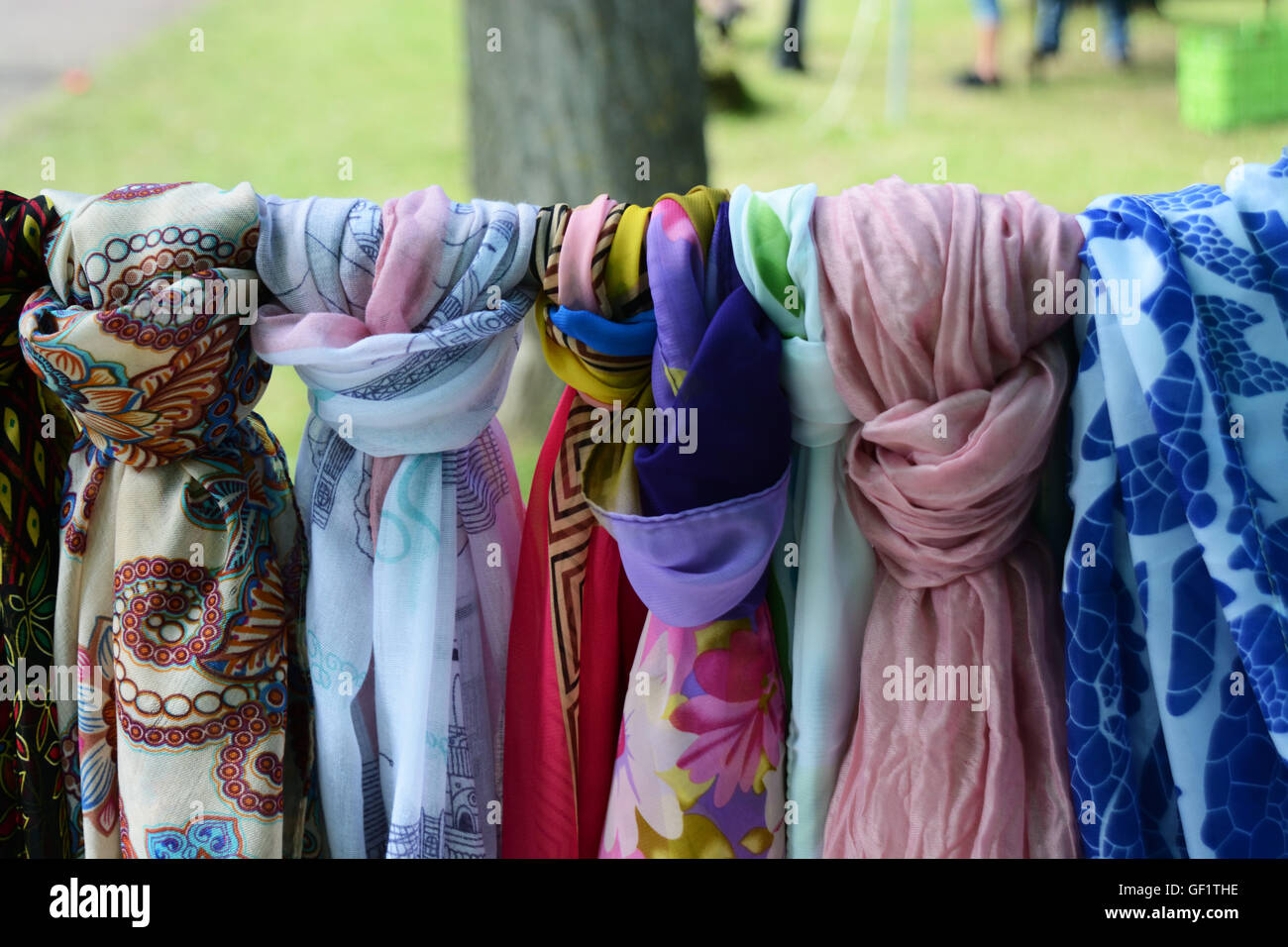 Scarves on display at a market, in Derbyshire Stock Photo - Alamy