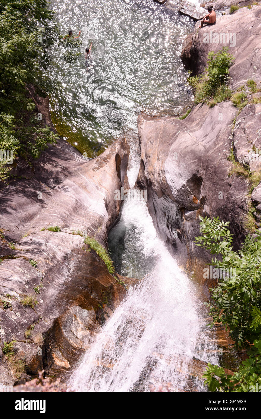 Biasca, Switzerland - 25 July 2016: people swimming in the pool of ...