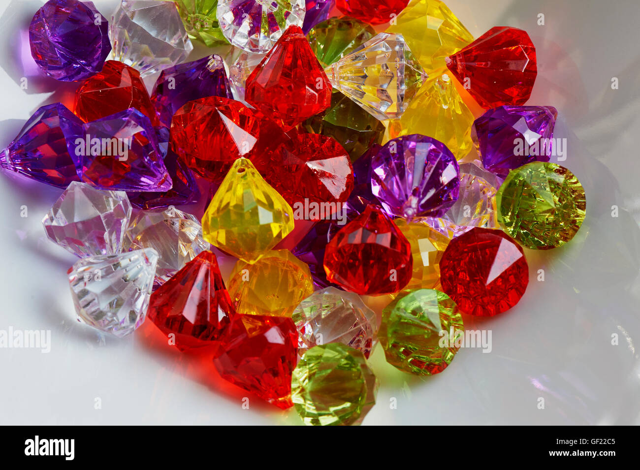 Decoration beatiful Multi-colored plastic beads, macro Cut Stock Photo ...