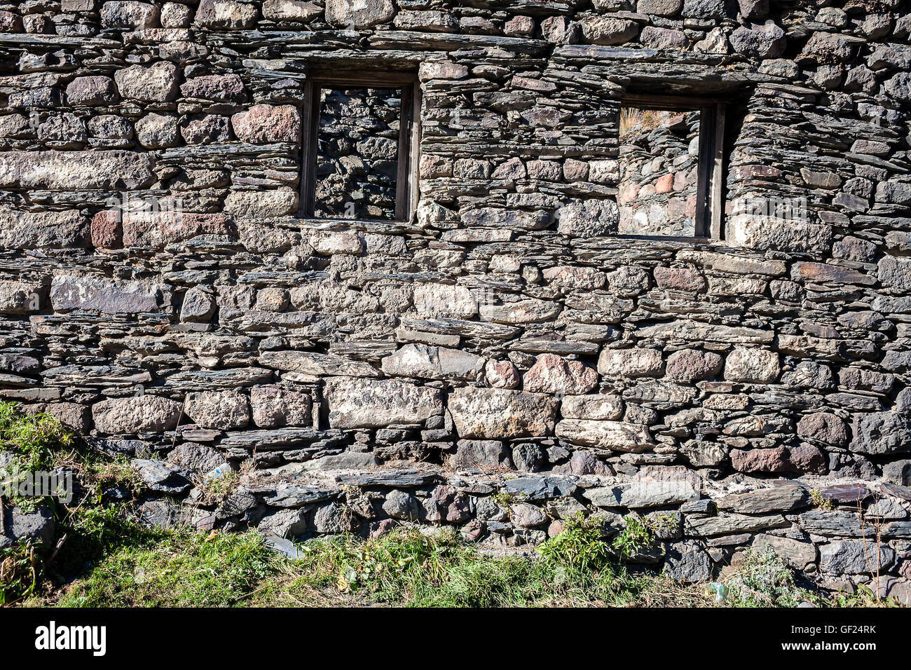 Stone wall with some window holes Stock Photo - Alamy