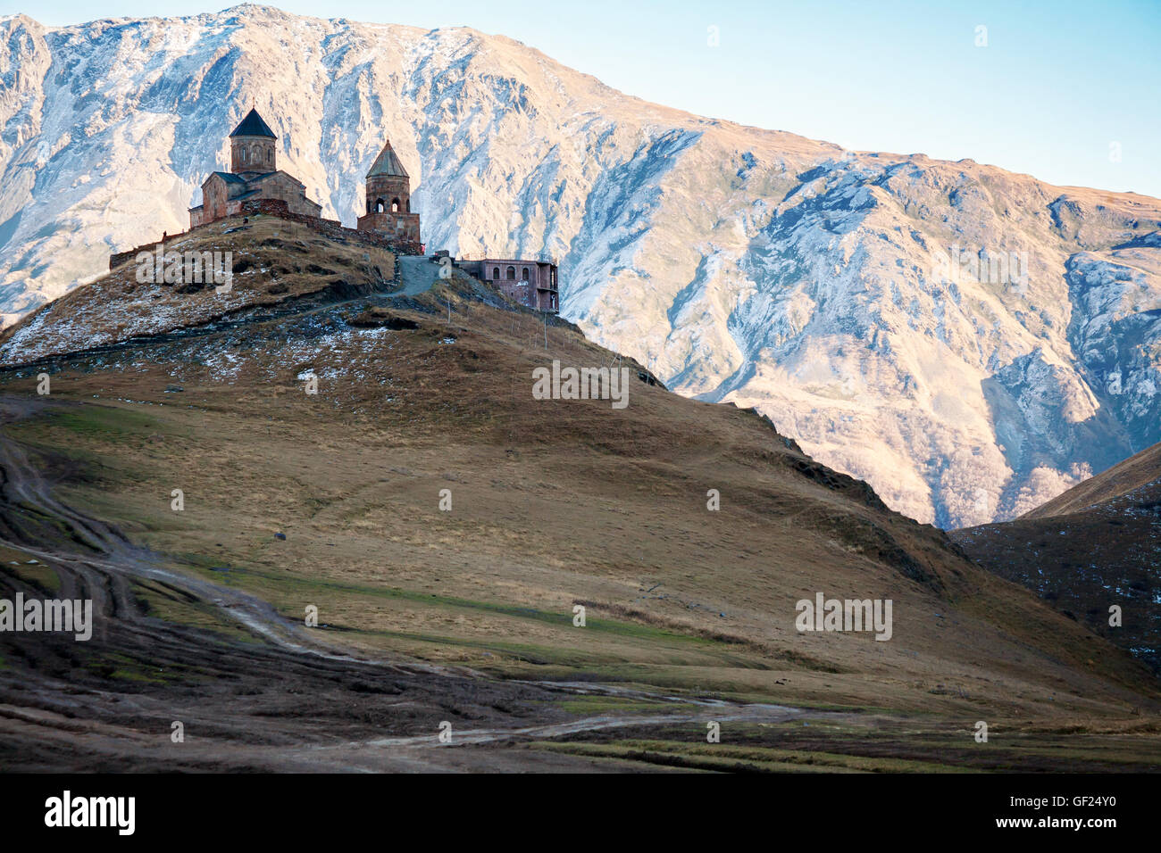 Gergeti Tsminda Sameba church in Georgian mountains Stock Photo - Alamy