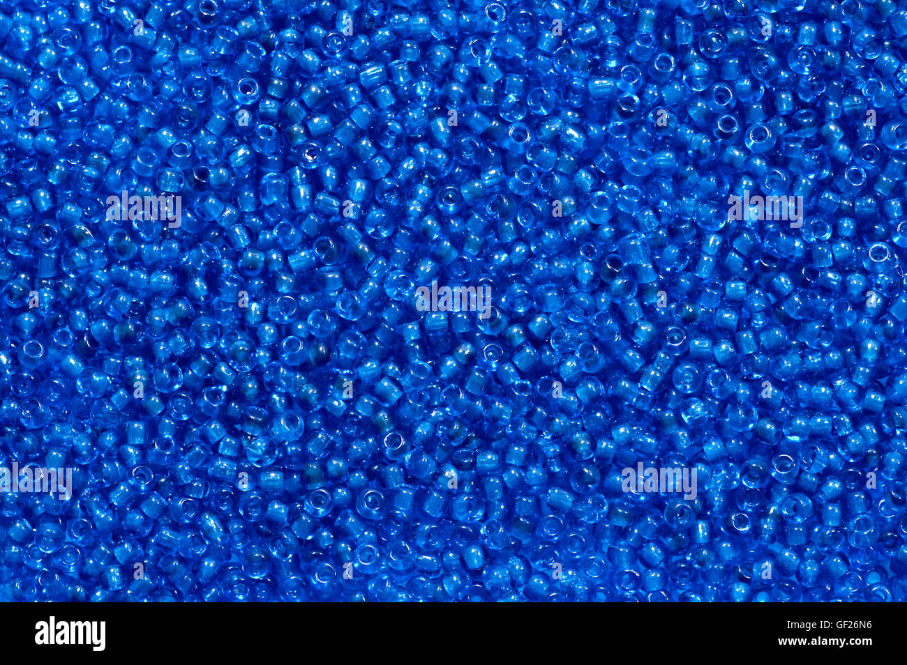 dark blue glass beads texture background Stock Photo - Alamy