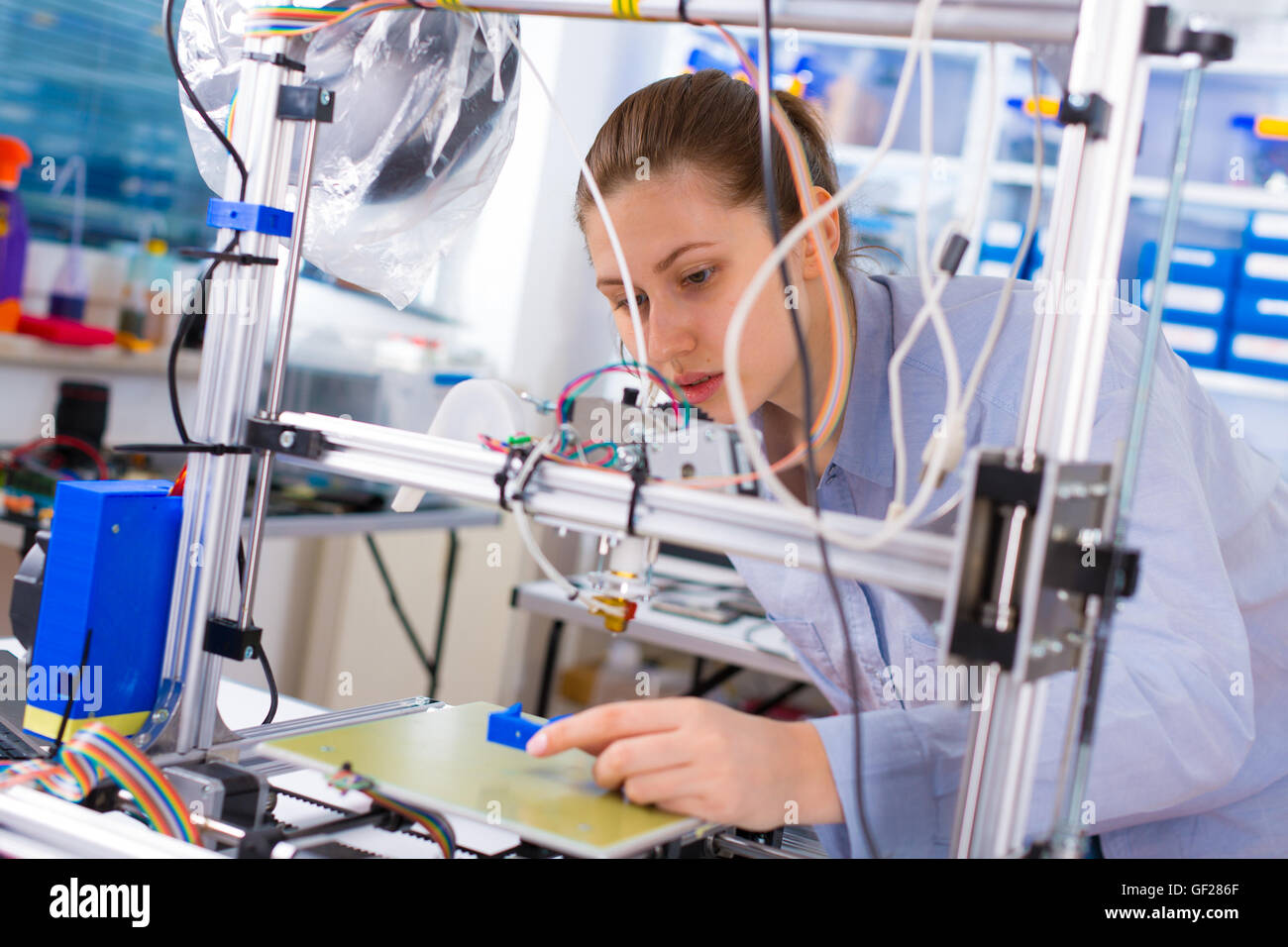 A student girl print prototype on 3D printer Stock Photo - Alamy