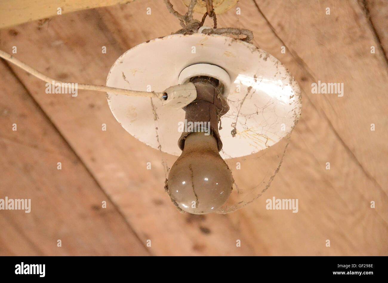 Dusty old lamp with cobweb. The lamp actually works Stock Photo - Alamy