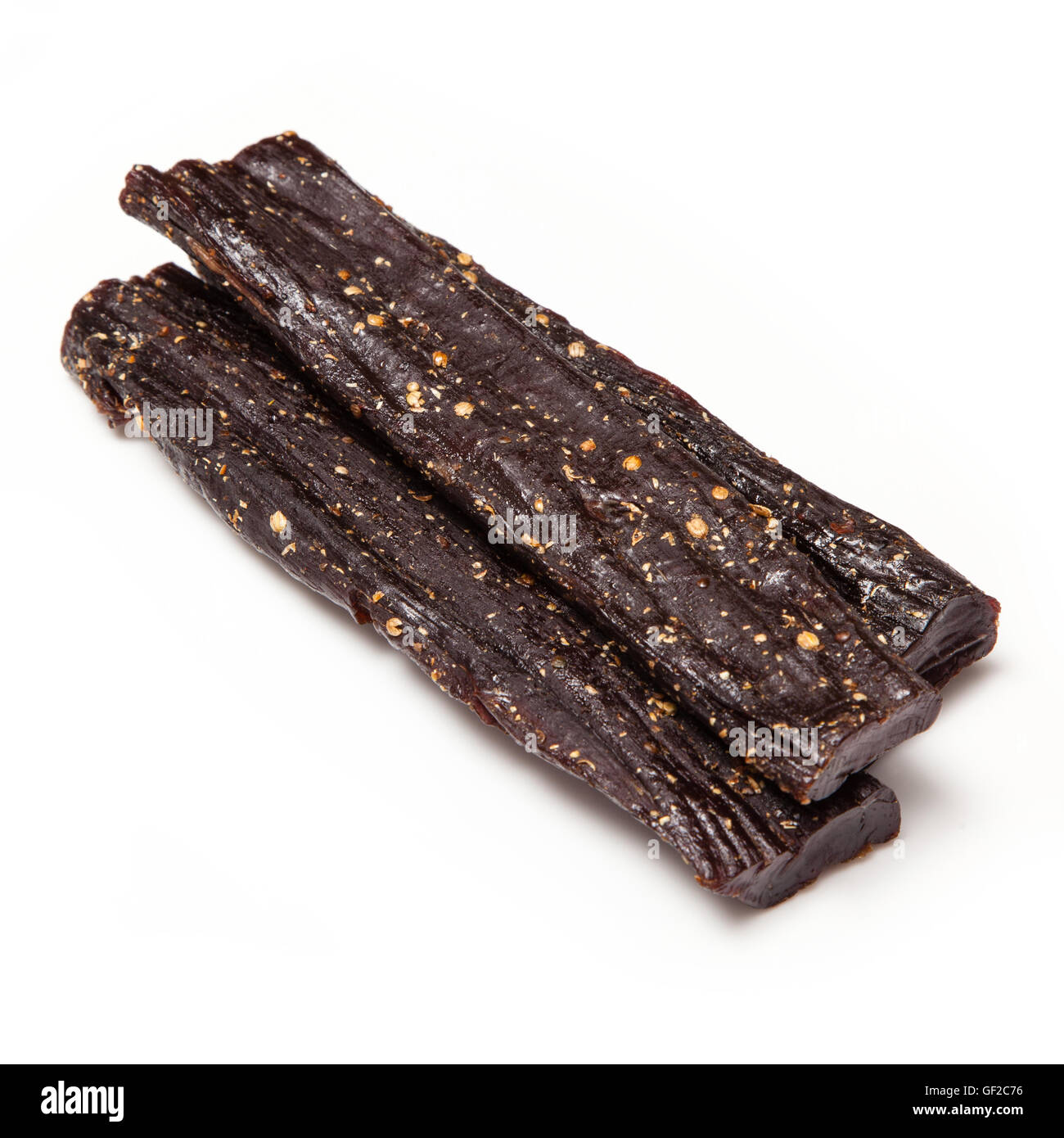 Beef Biltong sticks isolated on a white studio background Stock Photo ...