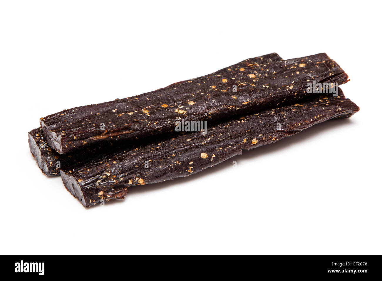 Beef Biltong sticks isolated on a white studio background Stock Photo ...