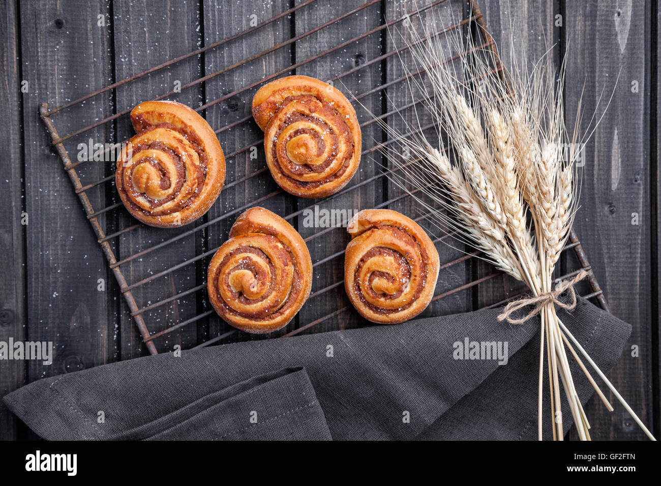 Delicious and fresh pastry on dark wooden background Stock Photo - Alamy
