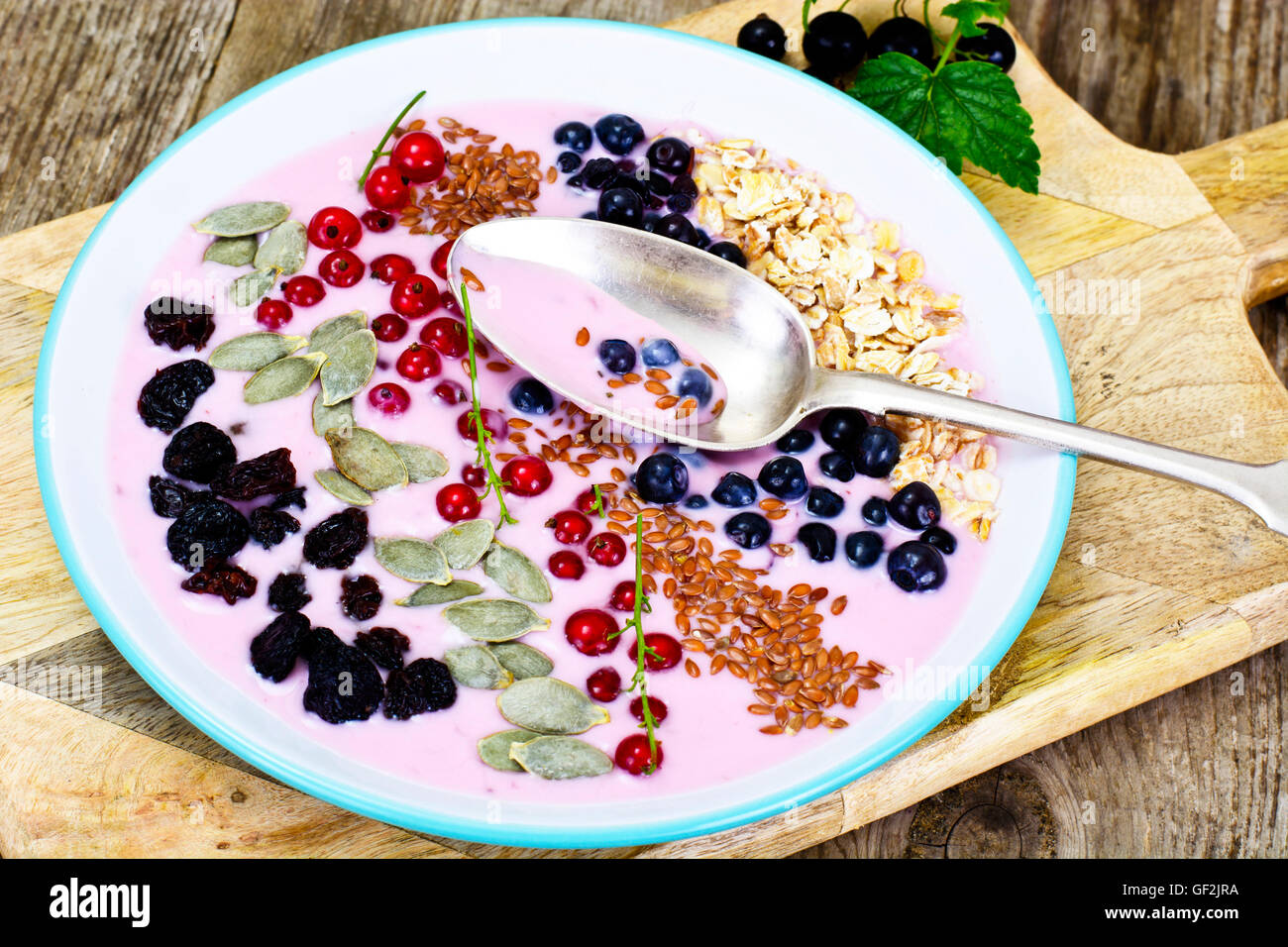 Smoothie with Blueberries, Oatmeal on Brown Boards Stock Photo - Alamy