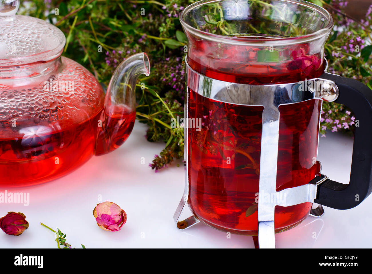 Red Rose Hibiscus Tea with Thyme Stock Photo - Alamy