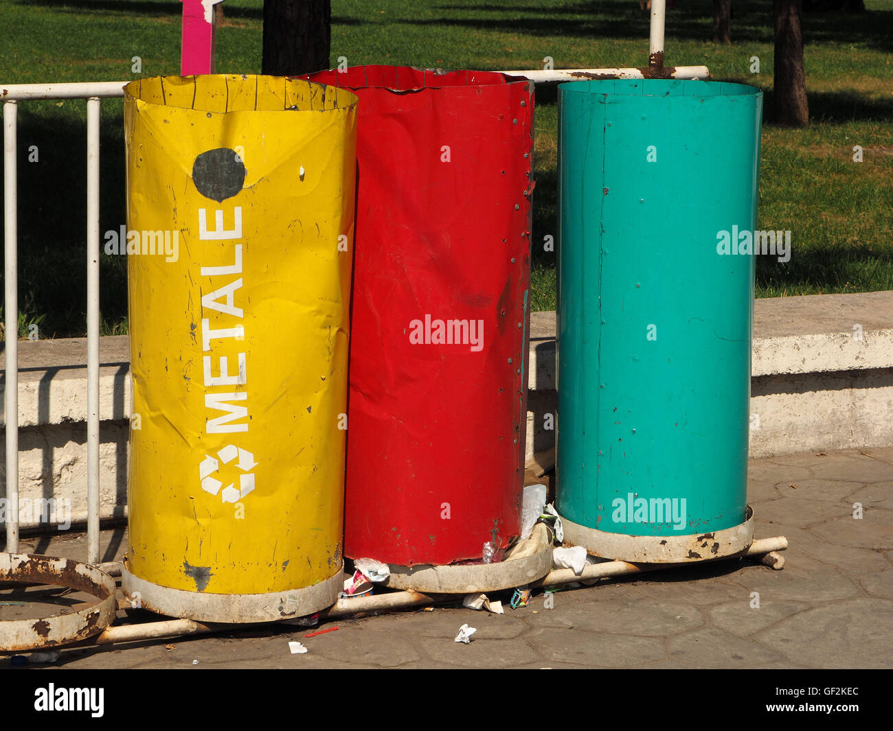 Brightly painted metal refuse recycling bins in Tirana capital of ...