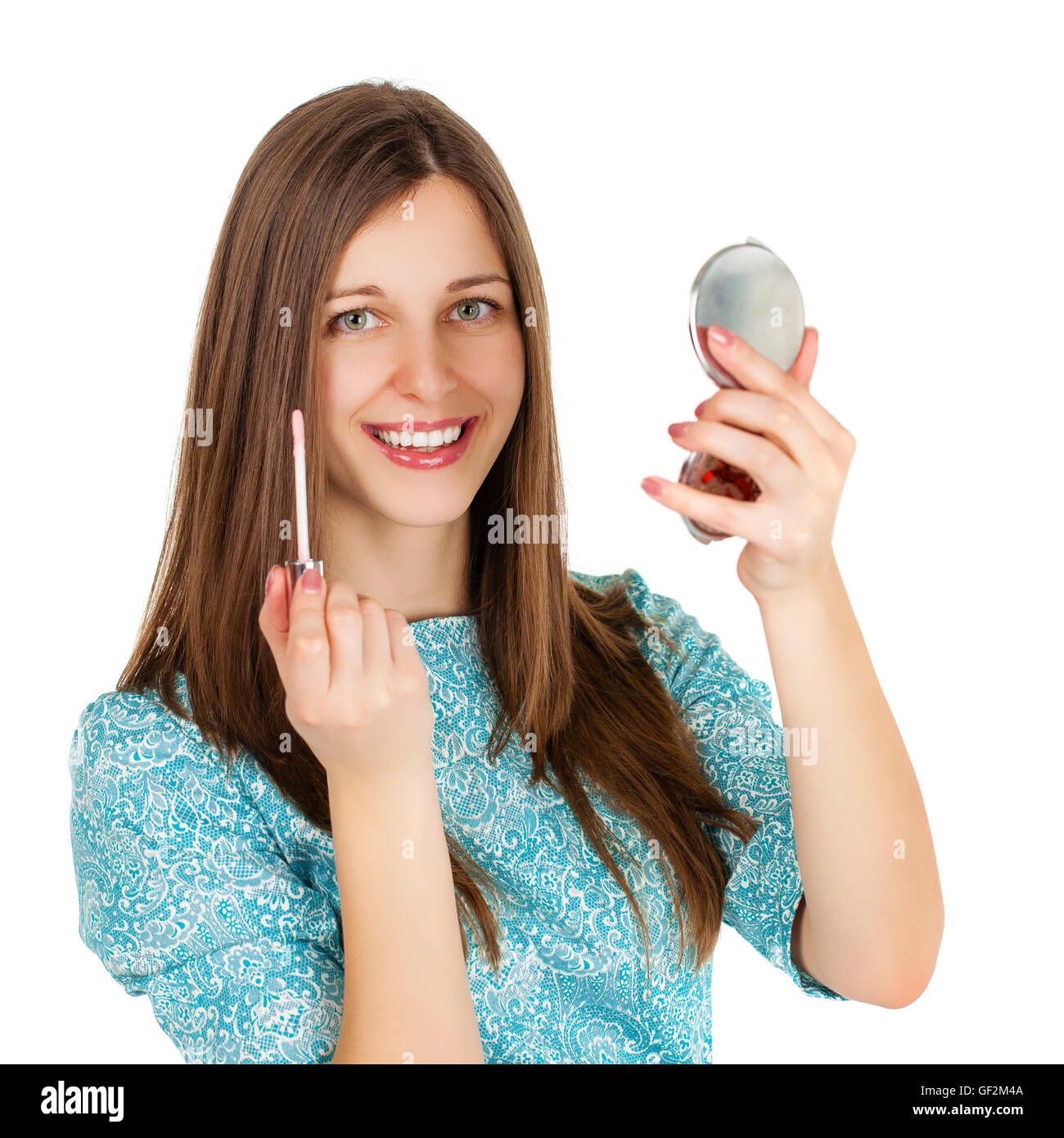 young beautiful woman applying powder on cheek with brush - isolated ...