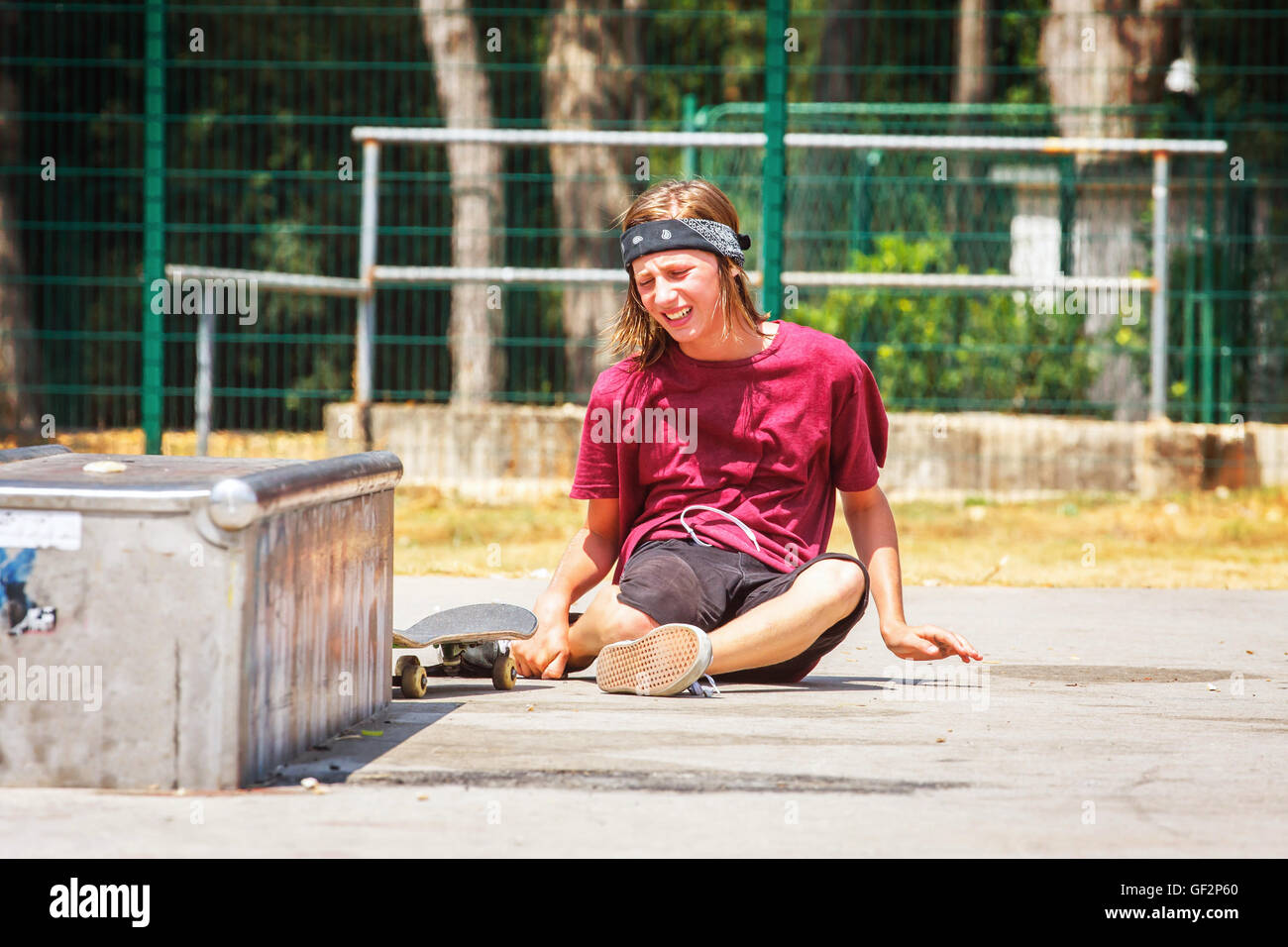 teenage boy with skateboard in the skate park Stock Photo - Alamy