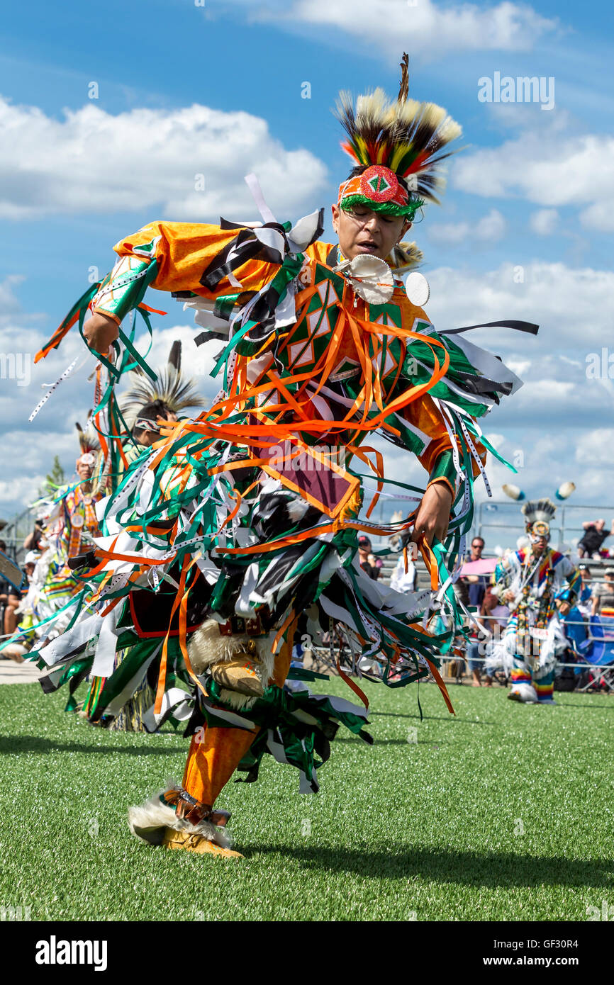 Colorfully dressed young man at powwow Stock Photo - Alamy