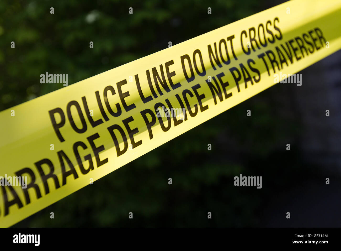 Police tape at a crime scene in Kingston, Ont., on June 10, 2016 Stock ...