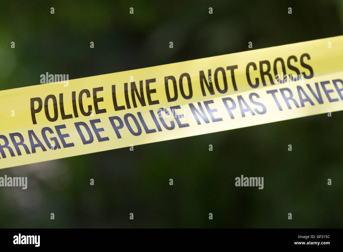 Police tape at a crime scene in Kingston, Ont., on June 10, 2016 Stock ...