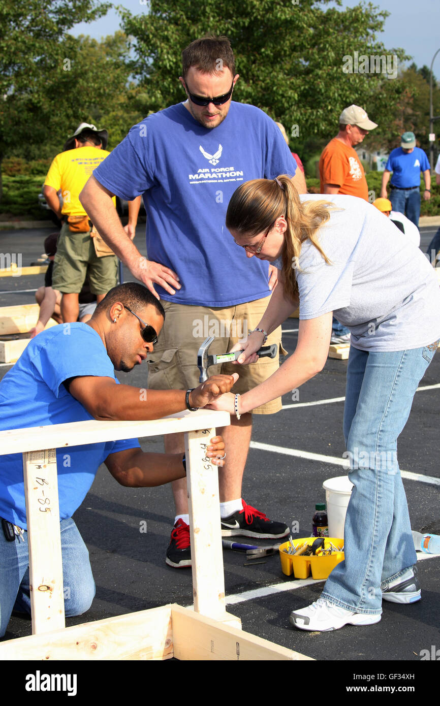 Volunteers building house frame hi-res stock photography and images - Alamy