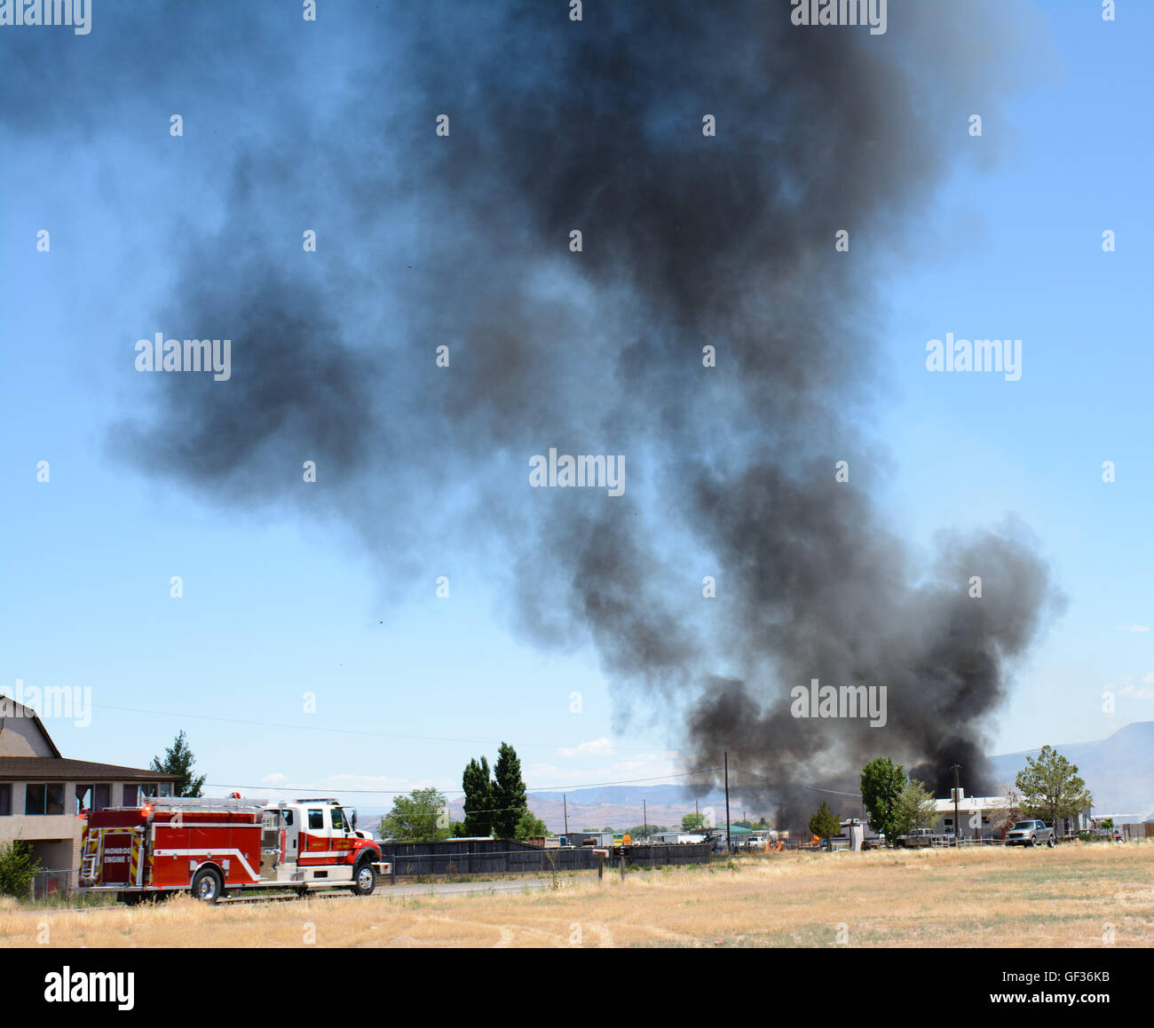 Fire truck at house fire hi-res stock photography and images - Alamy