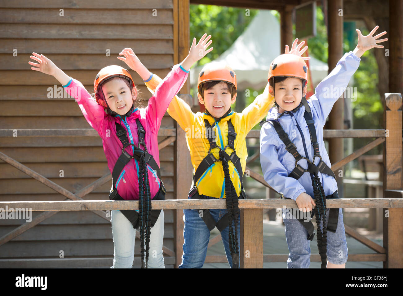 Happy Chinese children waving Stock Photo - Alamy