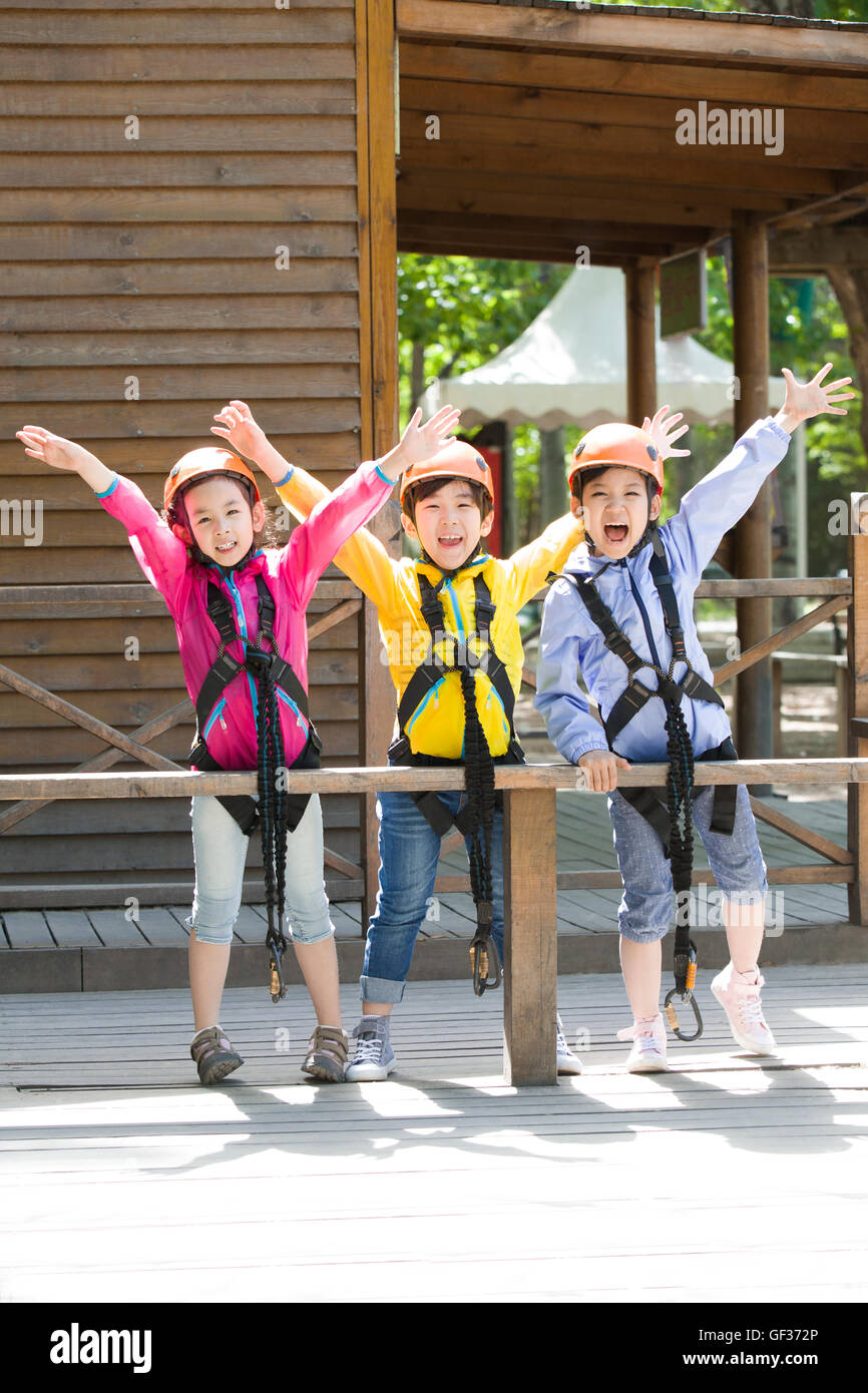 Happy Chinese children waving and shouting Stock Photo - Alamy